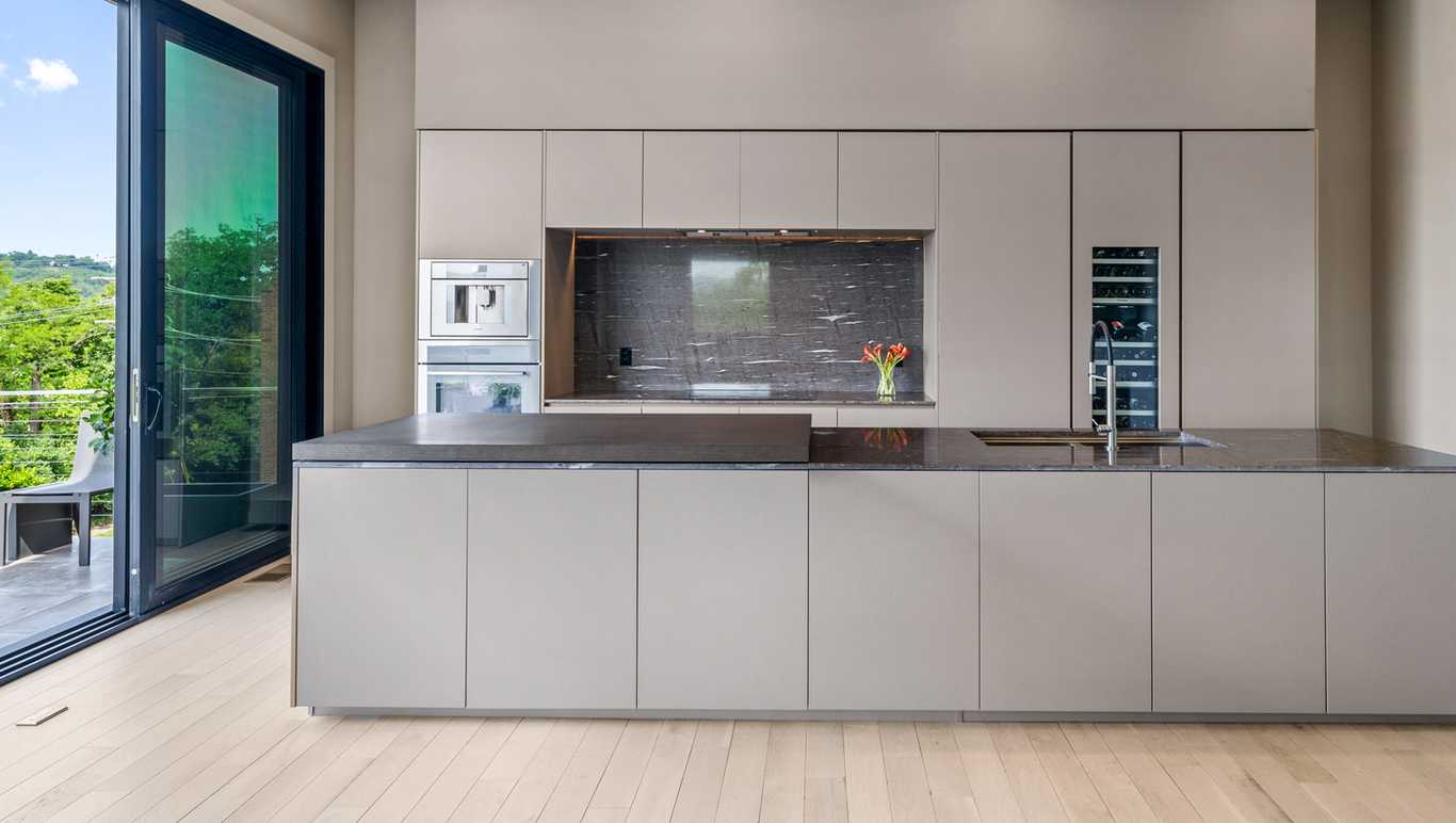 A High-Performance Kitchen Island Forms the Centerpiece of a New ...